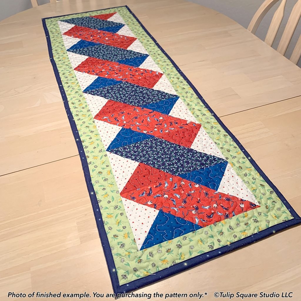 Ribbon Twist Gala Quilted Table Runner Pattern #576 - Tulip Square ...